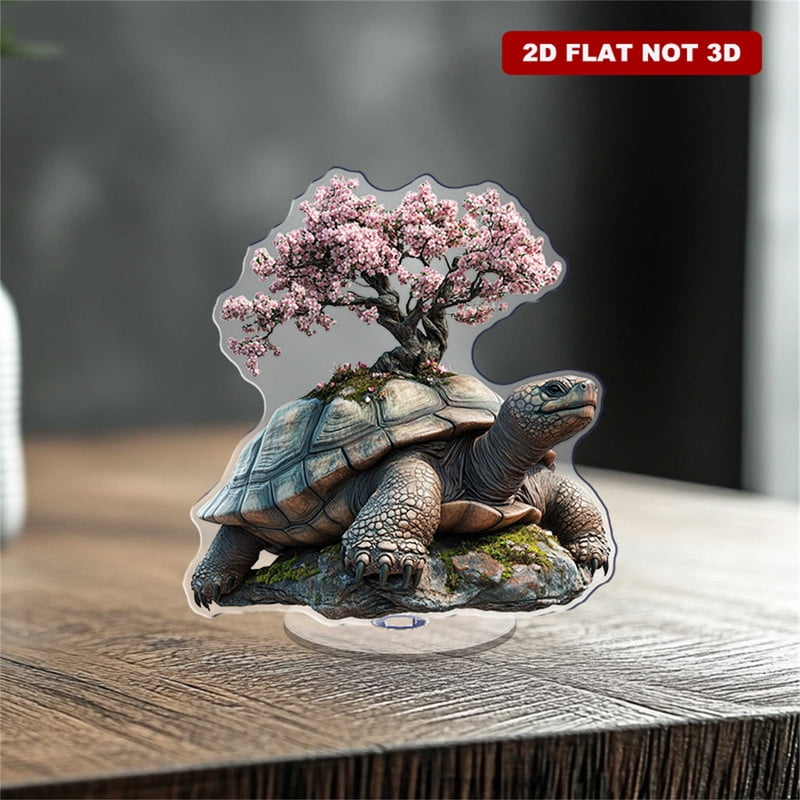 Rotating acrylic ornament featuring a giant turtle with a cherry ...