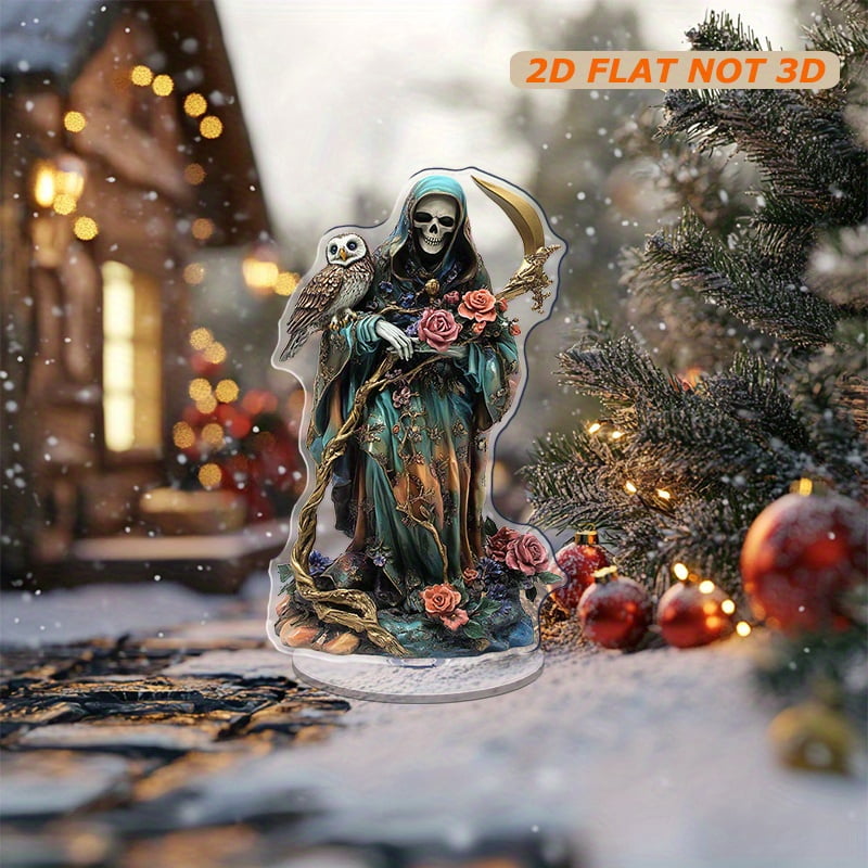 Rotating acrylic ornament featuring a golden Grim Reaper with an owl a ...
