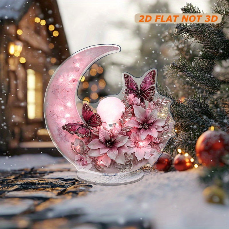 Rotating acrylic ornament featuring a half-moon design with Christmas ...