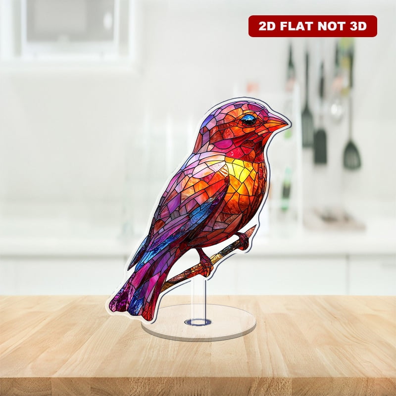 Rotating acrylic ornament featuring a realistic red bird in vibrant ...