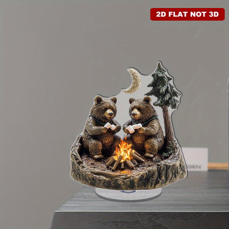 Rotating acrylic ornament featuring a resin statue of bears roasting ...