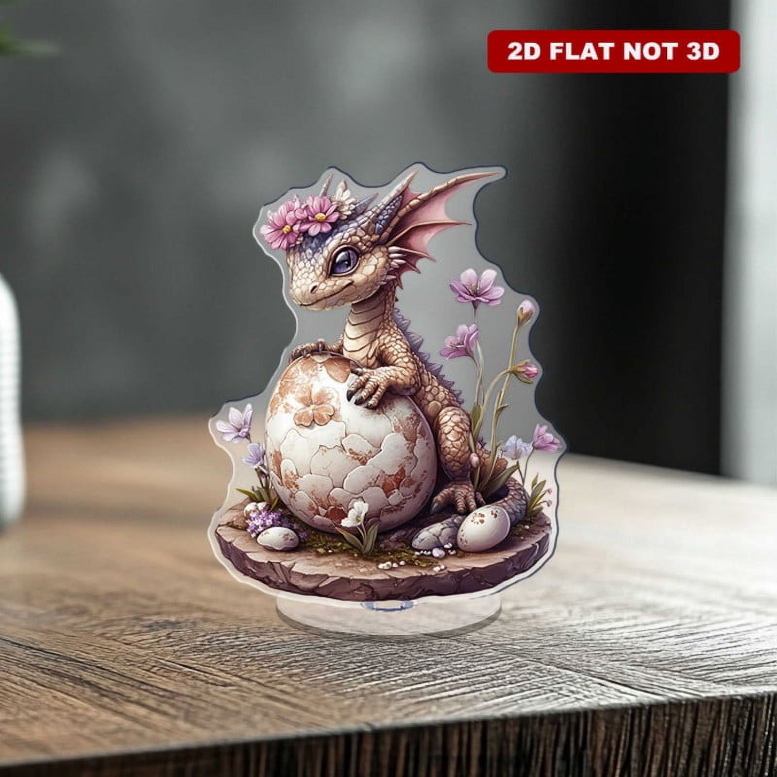 Rotating acrylic ornament featuring a small dragon just emerging from ...