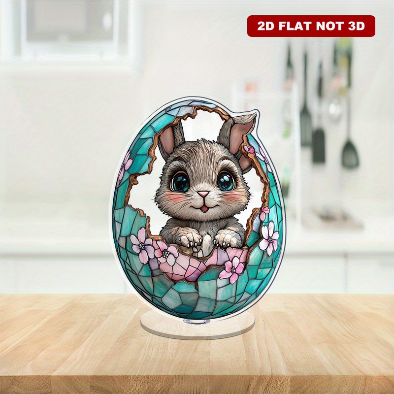 Rotating acrylic ornament featuring a stained glass appearance with ...