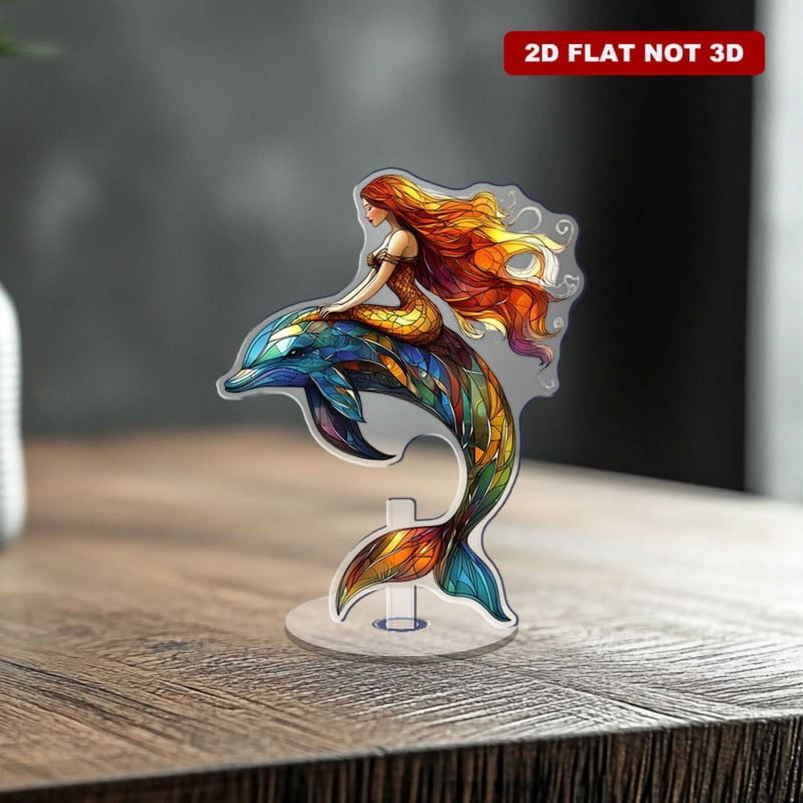 Rotating acrylic ornament featuring a stained glass mermaid atop a ...