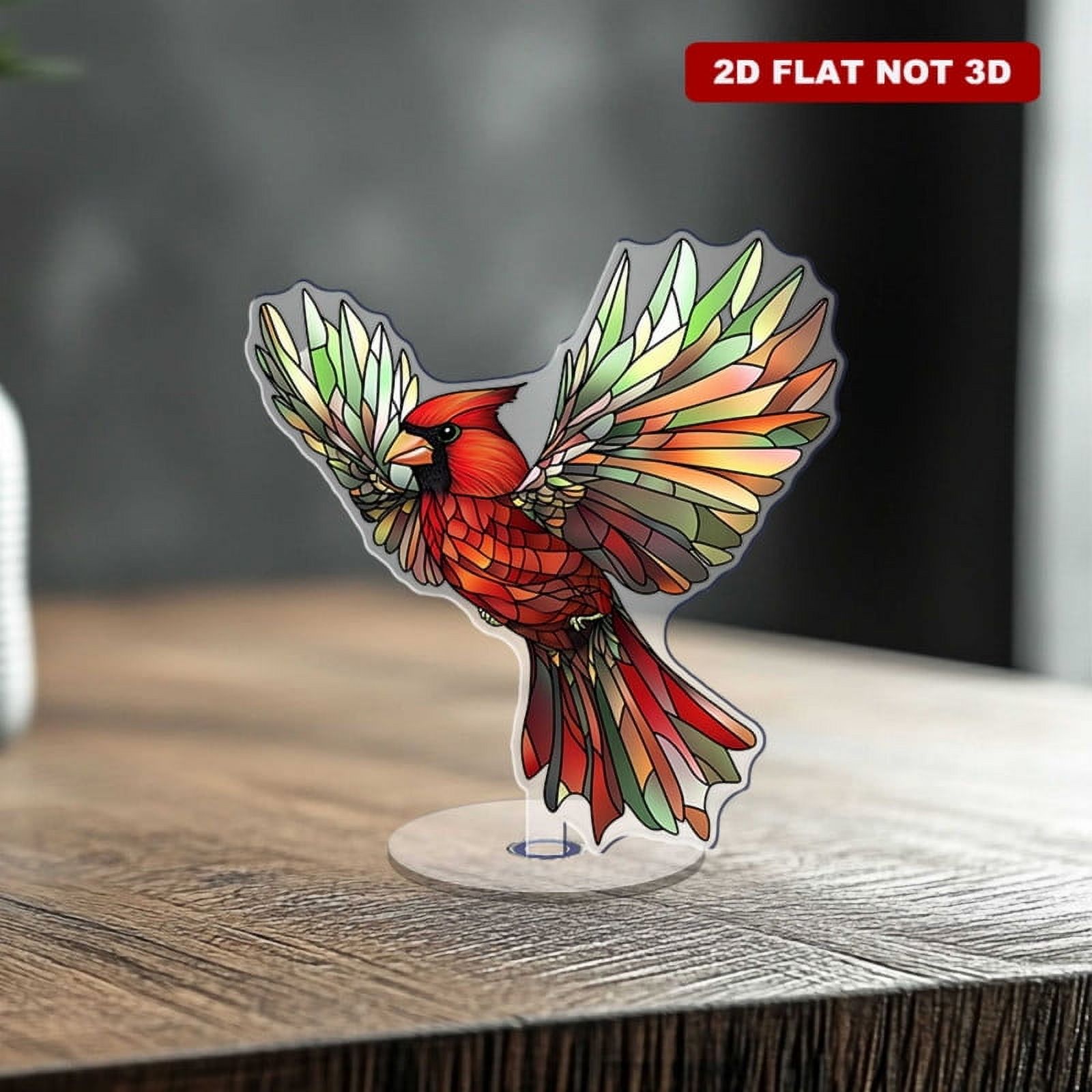 Rotating acrylic ornament featuring a stained glass red cardinal in ...