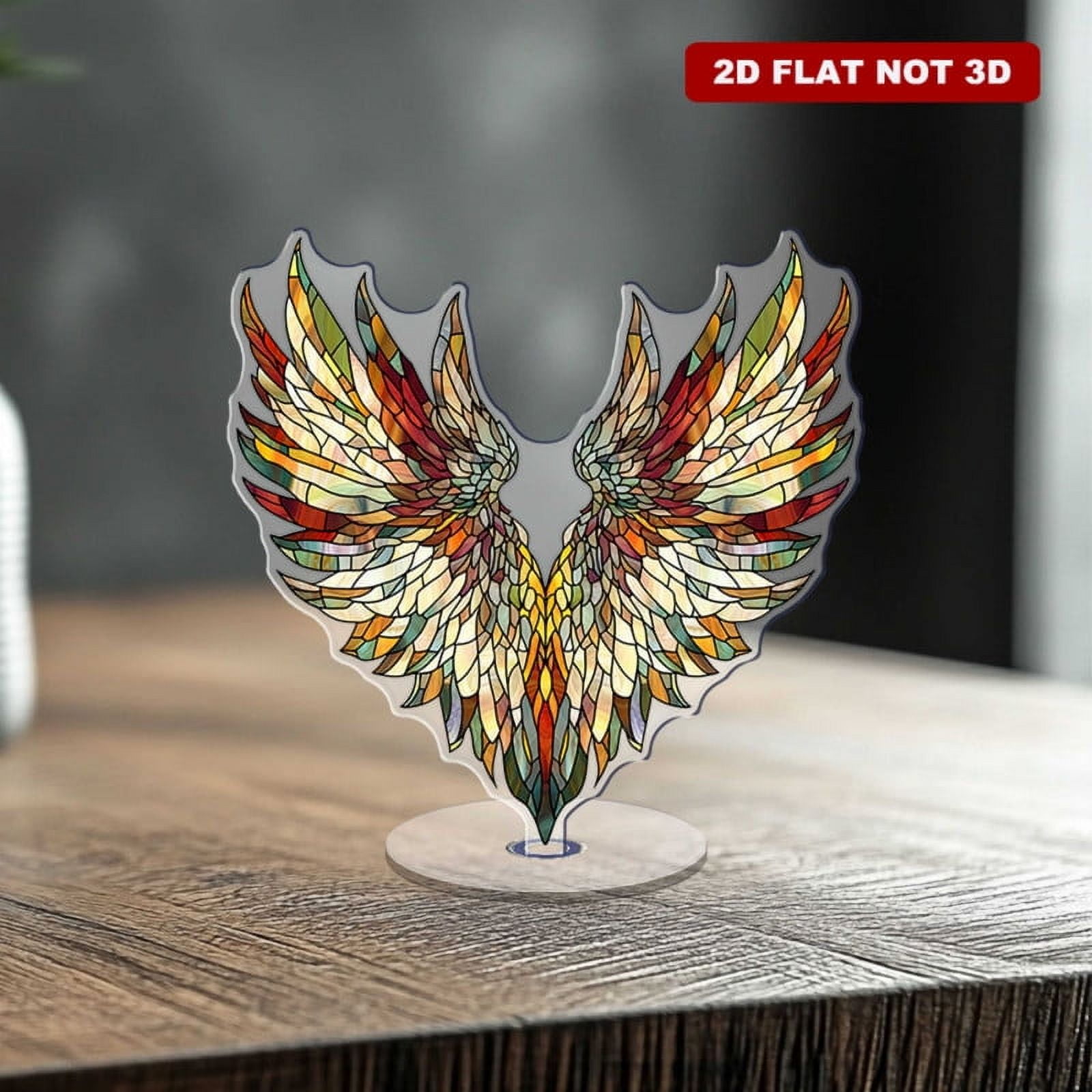 Rotating acrylic ornament featuring a symmetrical stained glass seraph ...