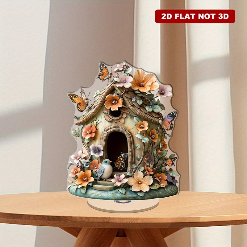 Rotating acrylic ornament featuring a vibrant ceramic aviary adorned ...