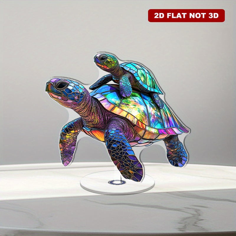 Rotating acrylic ornament featuring a vivid baby turtle on an adult ...