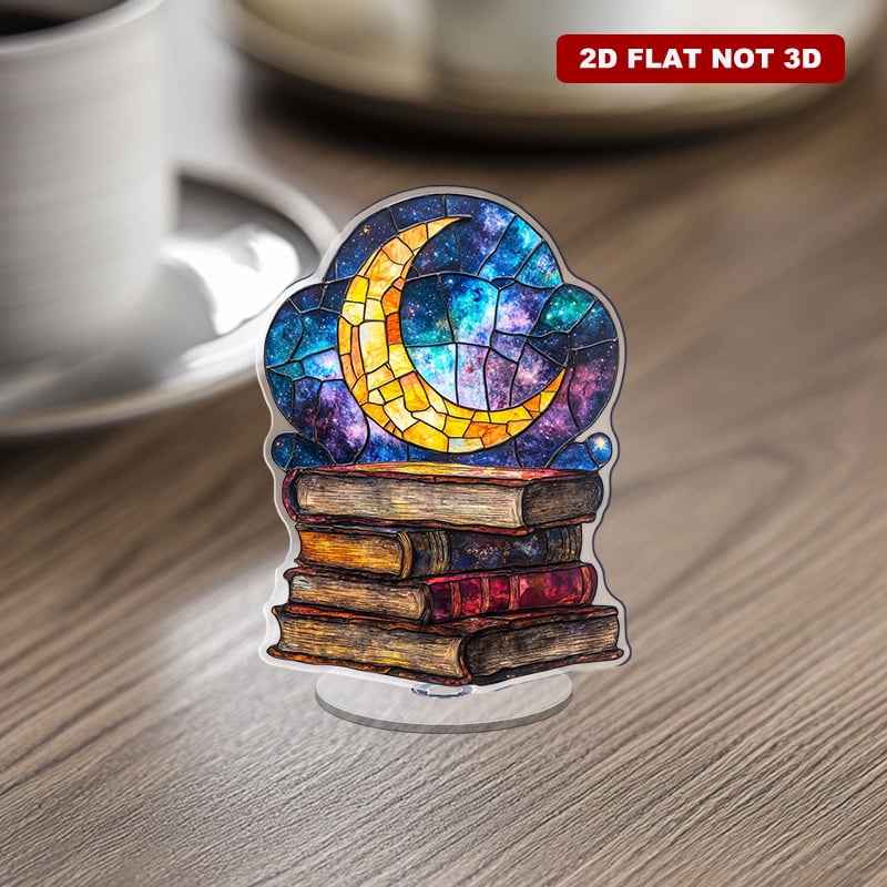 Rotating acrylic ornament featuring a watercolor stack of books with a moon and galaxy theme ...