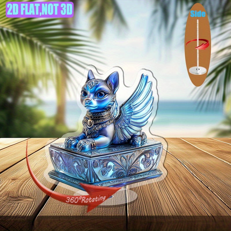 Rotating acrylic ornament featuring a wise sphinx with deep blue wings ...