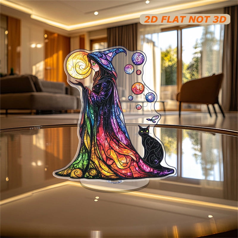 Rotating acrylic ornament featuring a witch with a black cat glowing ...