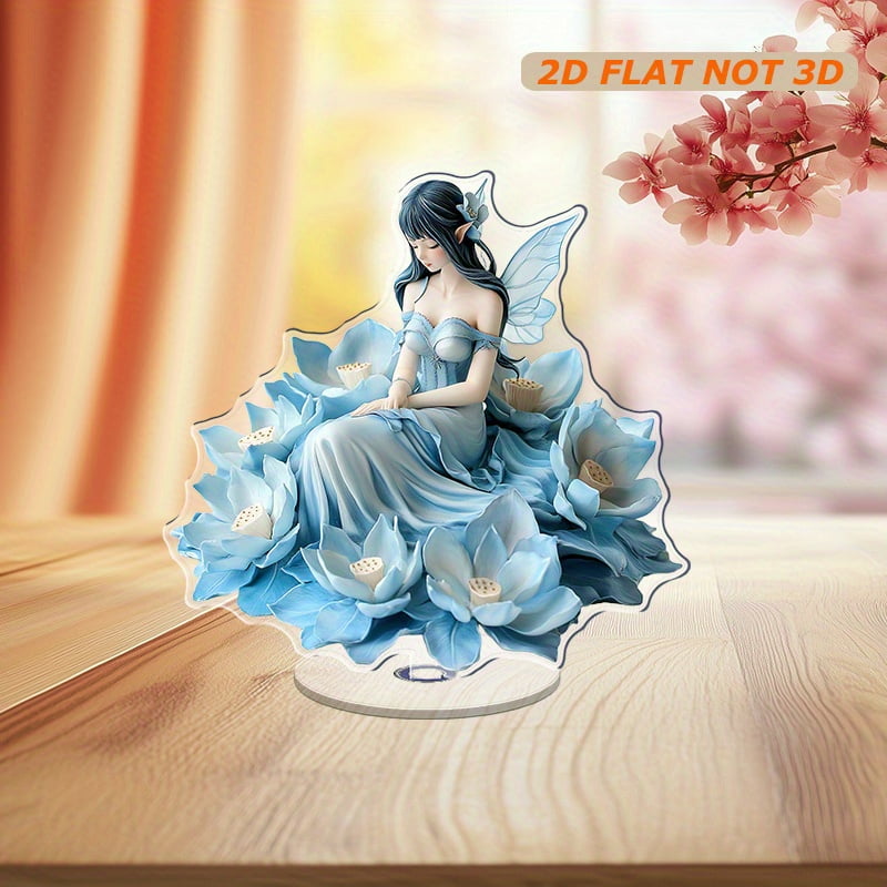 Rotating acrylic ornament featuring an elegant flower fairy on a light ...