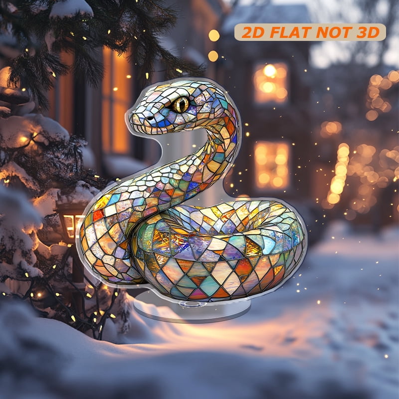 Rotating acrylic ornament featuring an elegant snake statue adorned ...