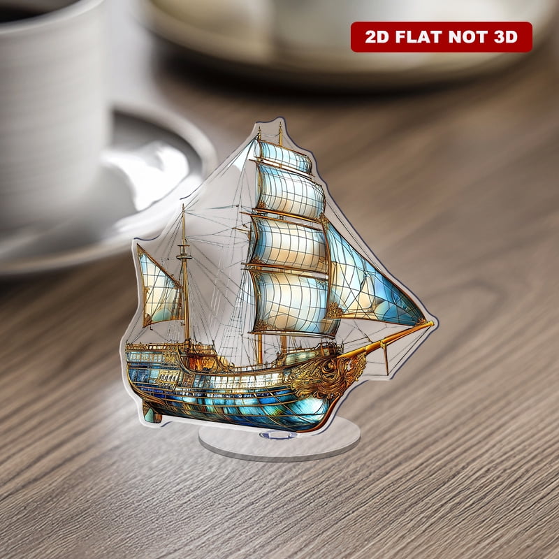 Rotating acrylic ornament featuring an old sailing ship with golden ...