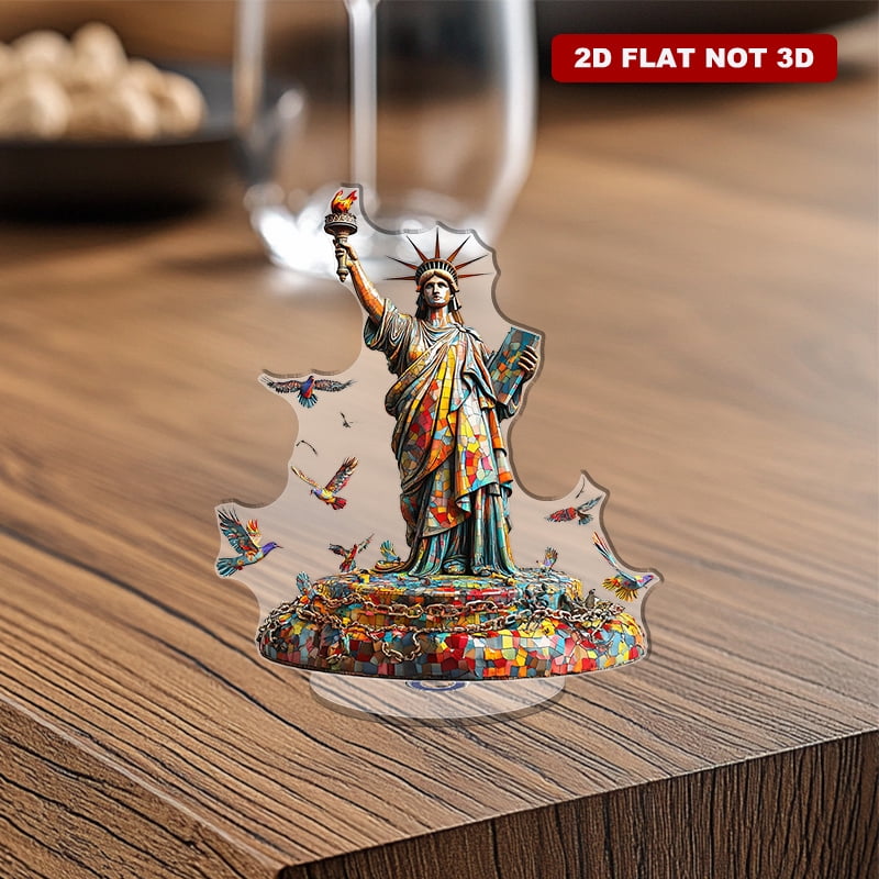 Rotating acrylic ornament featuring a colorful Statue of Liberty with a ...