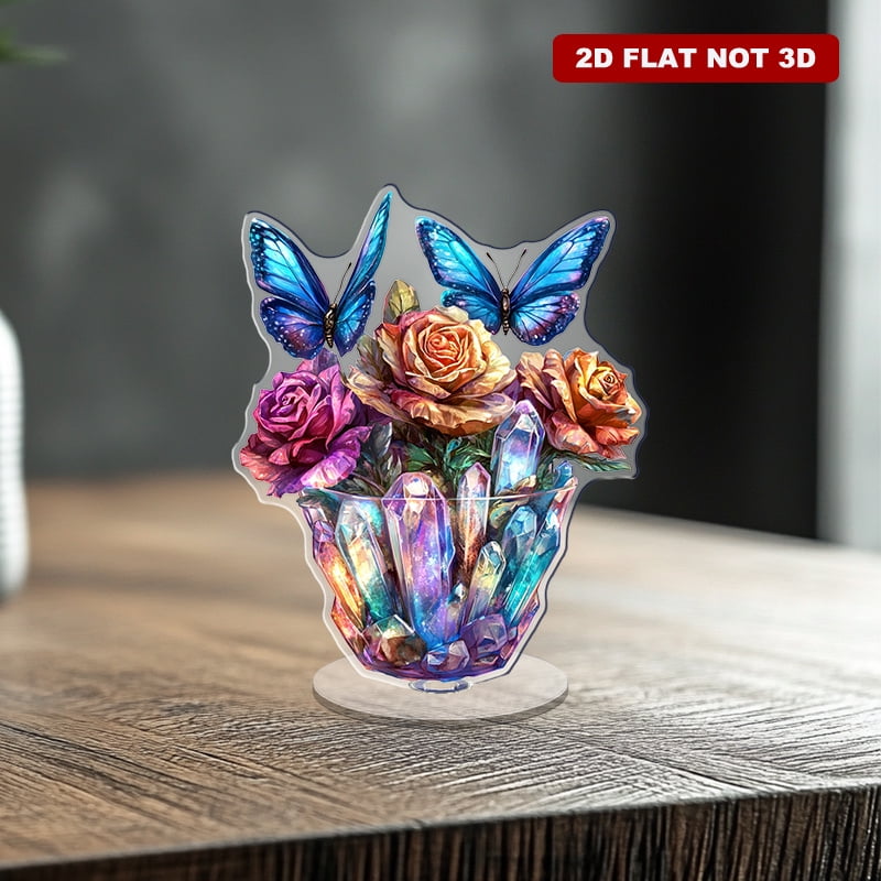 Rotating acrylic ornament featuring a colorful crystal flower pot with ...