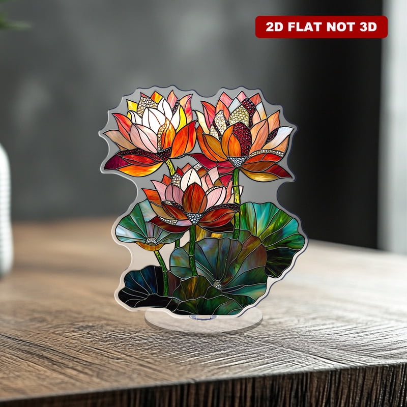Rotating acrylic ornament featuring a complex stained glass design of ...