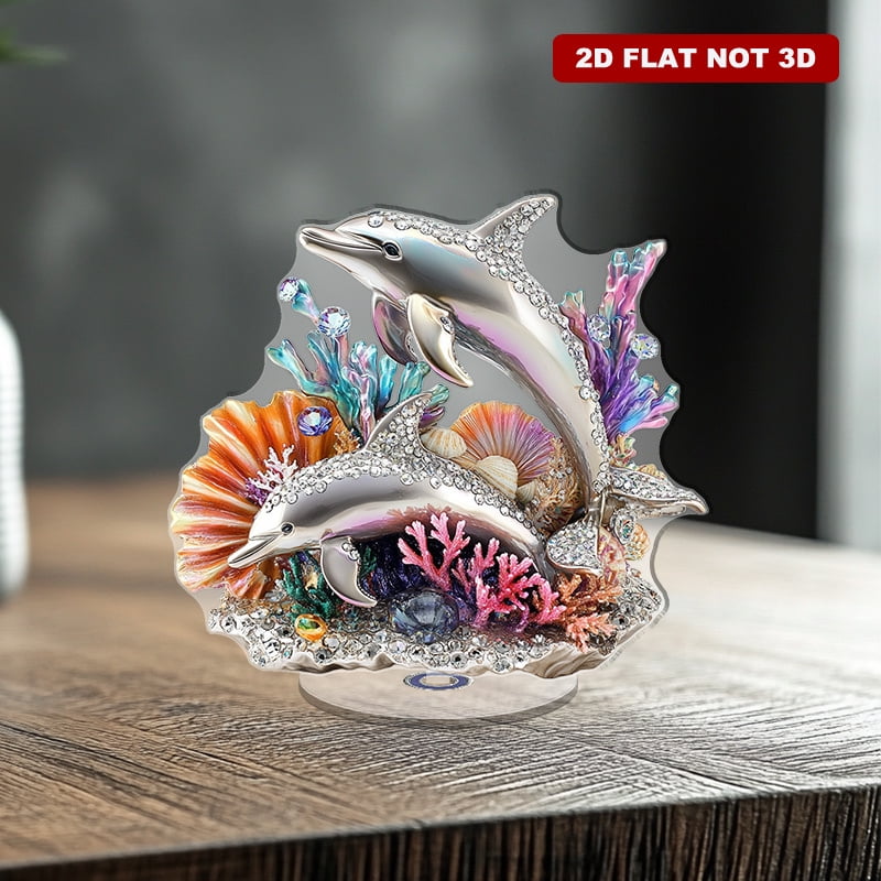 Rotating acrylic ornament featuring crystal dolphins amidst colorful ...