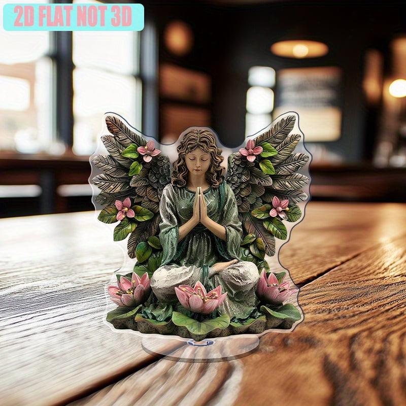 Rotating acrylic ornament featuring a detailed angel on a lotus with ...