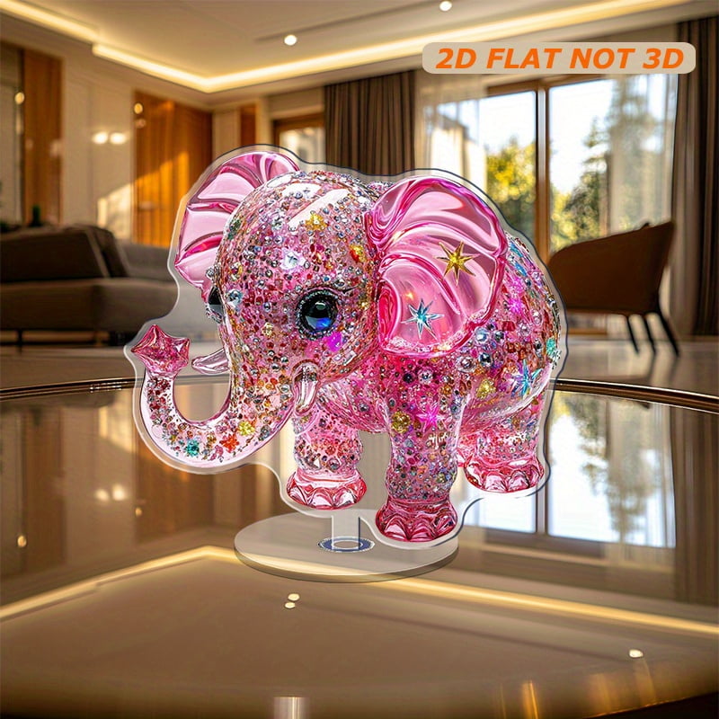 Rotating acrylic ornament featuring a detailed pink elephant sculpture ...