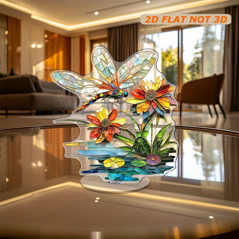 Rotating acrylic ornament featuring dragonflies and flowers on a lake ...