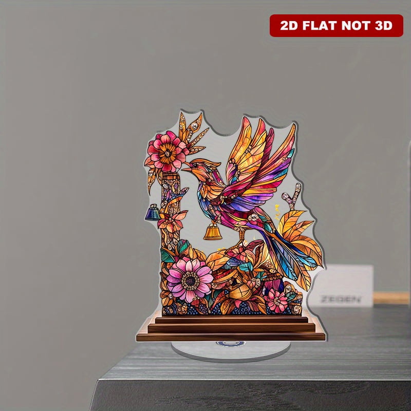 Rotating acrylic ornament featuring a nightingale with open wings bells ...