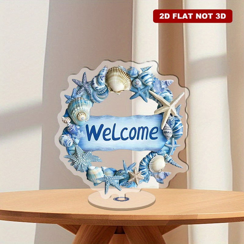 Rotating acrylic ornament featuring ocean-themed design with blue ...