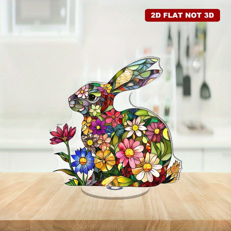 Rotating acrylic ornament featuring stained glass design of a floral ...