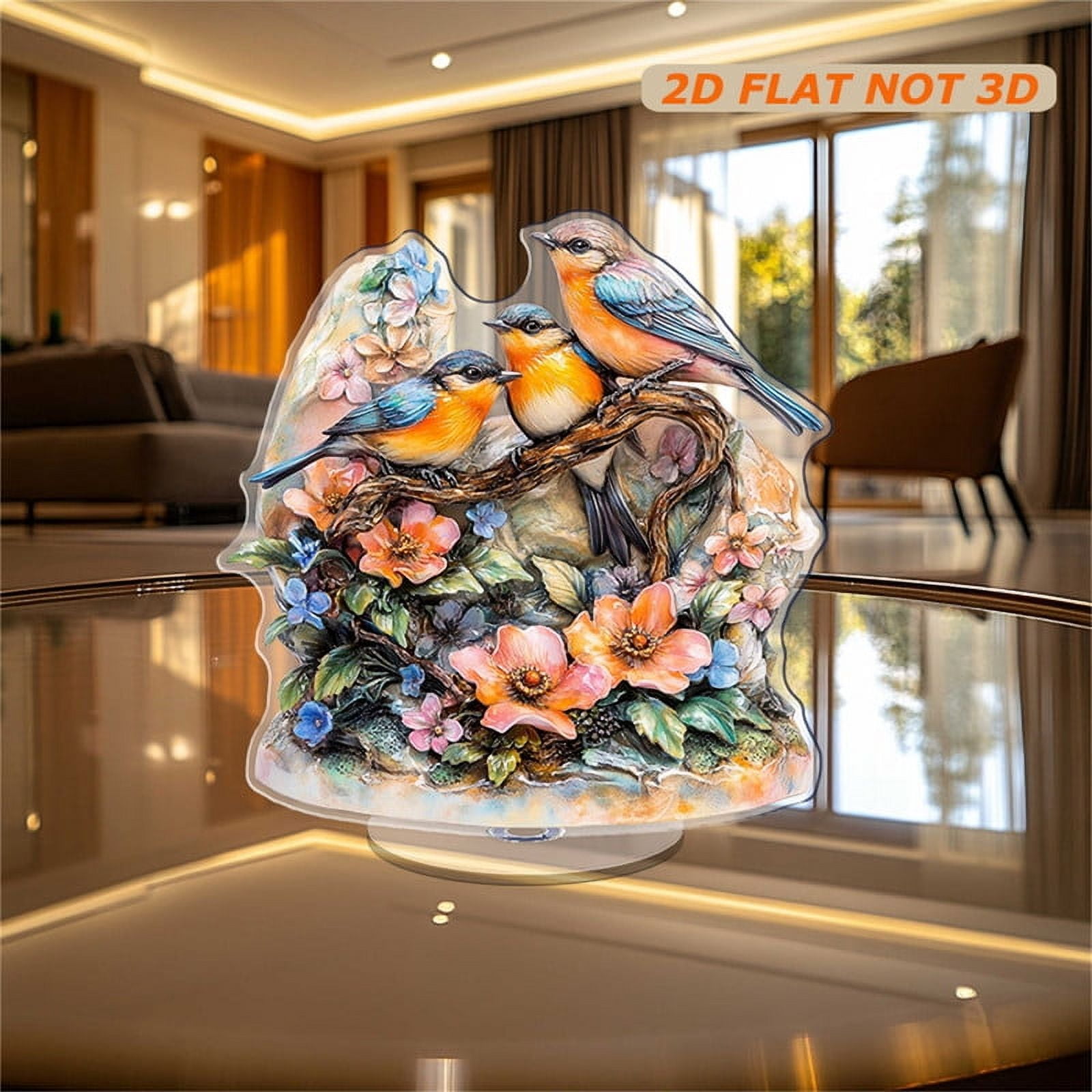 Rotating acrylic ornament featuring three birds on branches with a ...