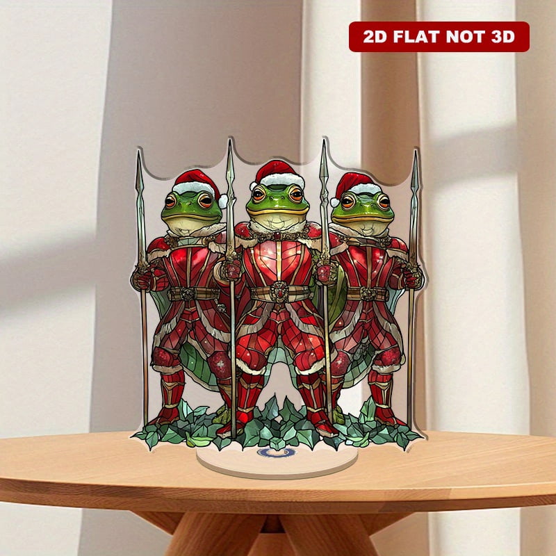 Rotating acrylic ornament featuring three frog prince soldiers in red ...