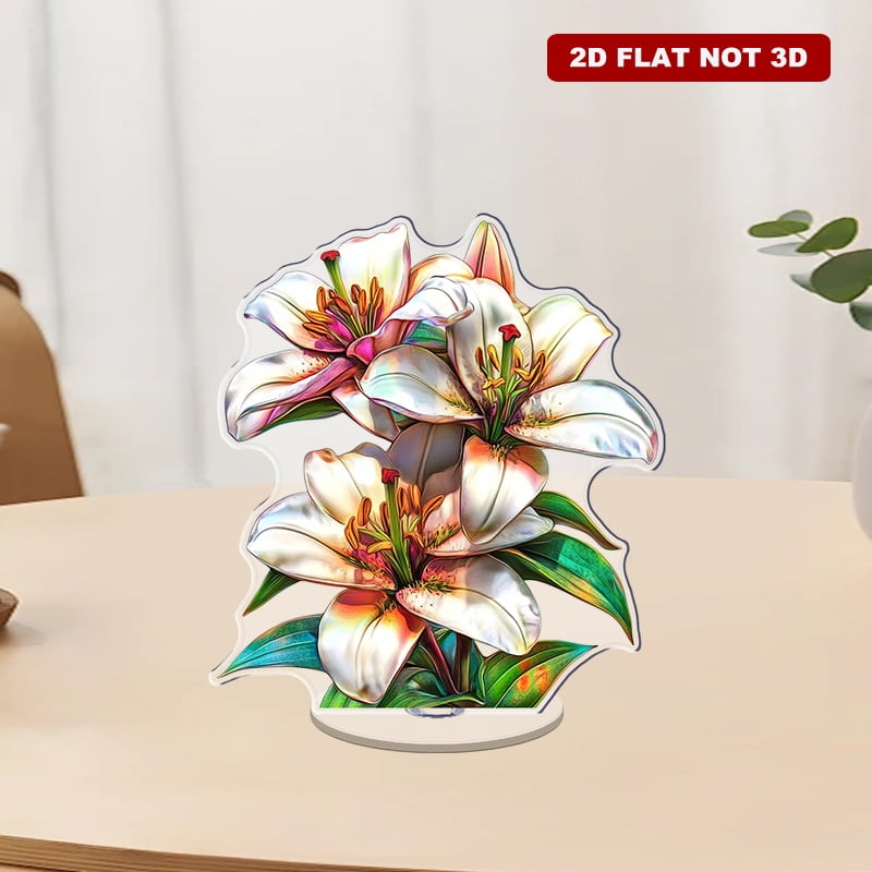 Rotating acrylic ornament featuring vibrant lily flowers on a white ...