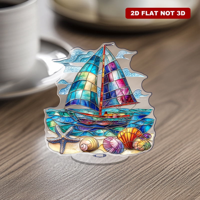 Rotating acrylic ornament featuring a vibrant sailboat on the beach ...