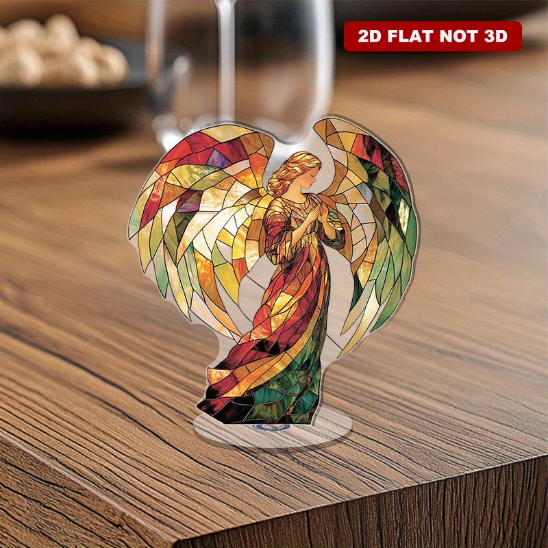Rotating acrylic ornament featuring a vibrant stained-glass angel with ...