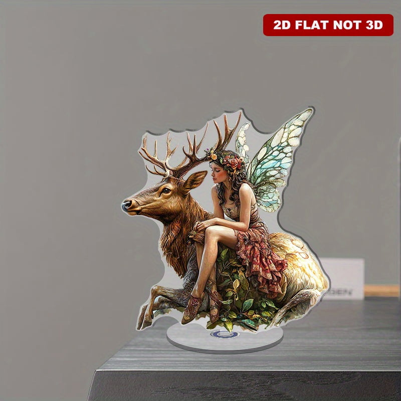 Rotating acrylic ornament featuring a vividly detailed fairy with wings ...