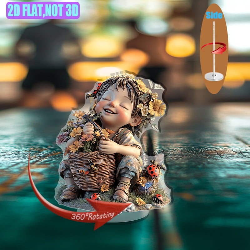 Rotating acrylic ornament featuring a whimsical figure with flowers in ...