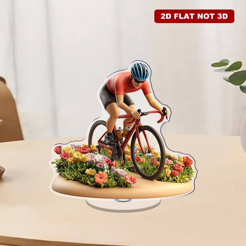 Rotating acrylic piece featuring a cheerful cyclist in a helmet ...