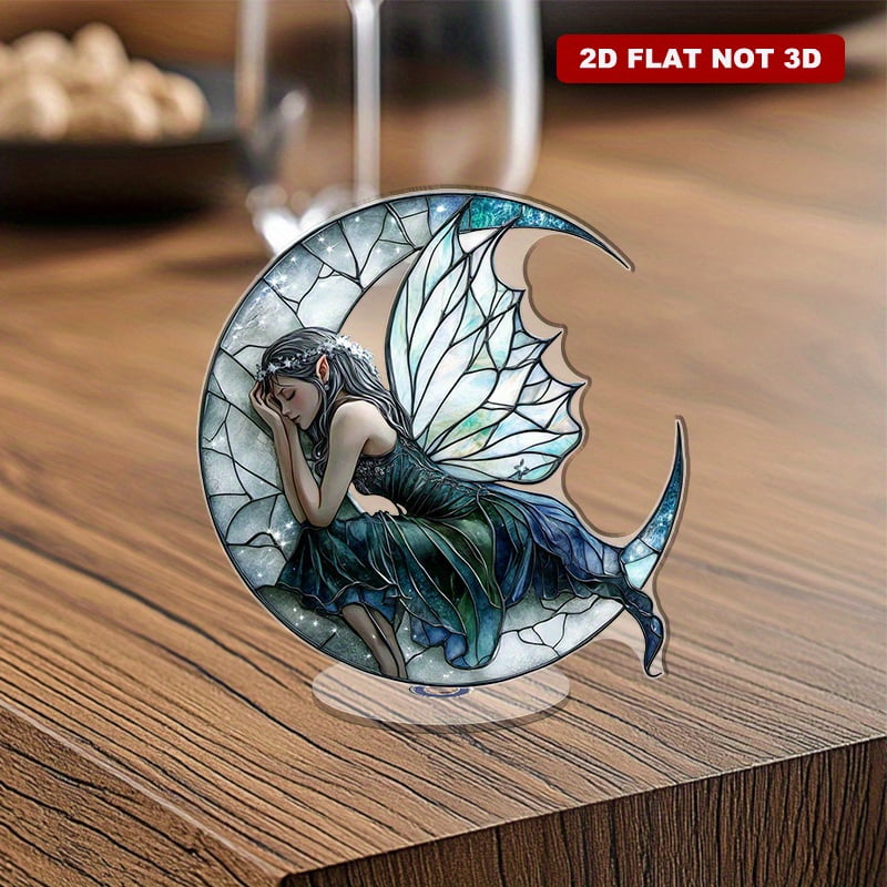 Rotating acrylic piece featuring a fairy sleeping on a crescent moon ...