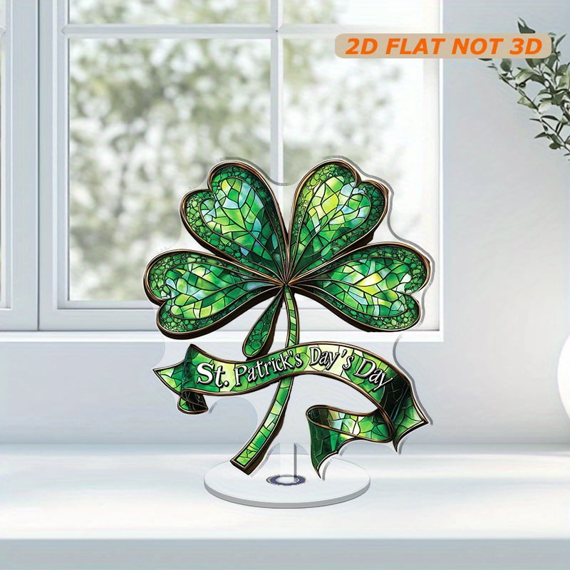 Rotating acrylic piece featuring a vibrant stained-glass shamrock with ...