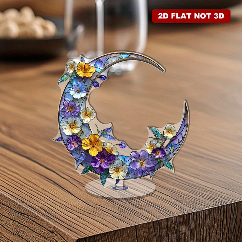 Rotating acrylic piece featuring a crescent moon adorned with vibrant ...