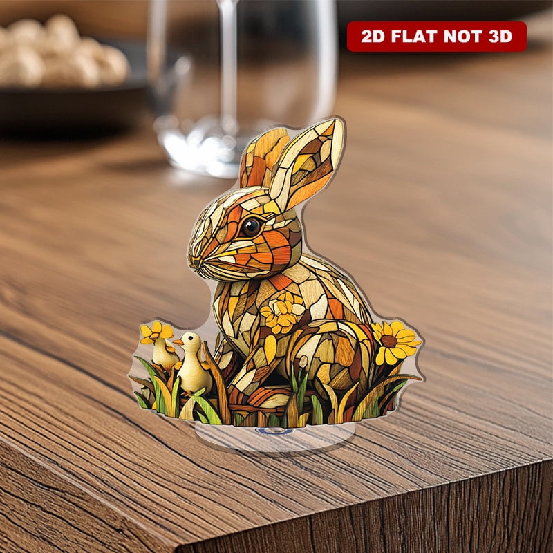 Rotating acrylic sculpture featuring a detailed rabbit surrounded by ...