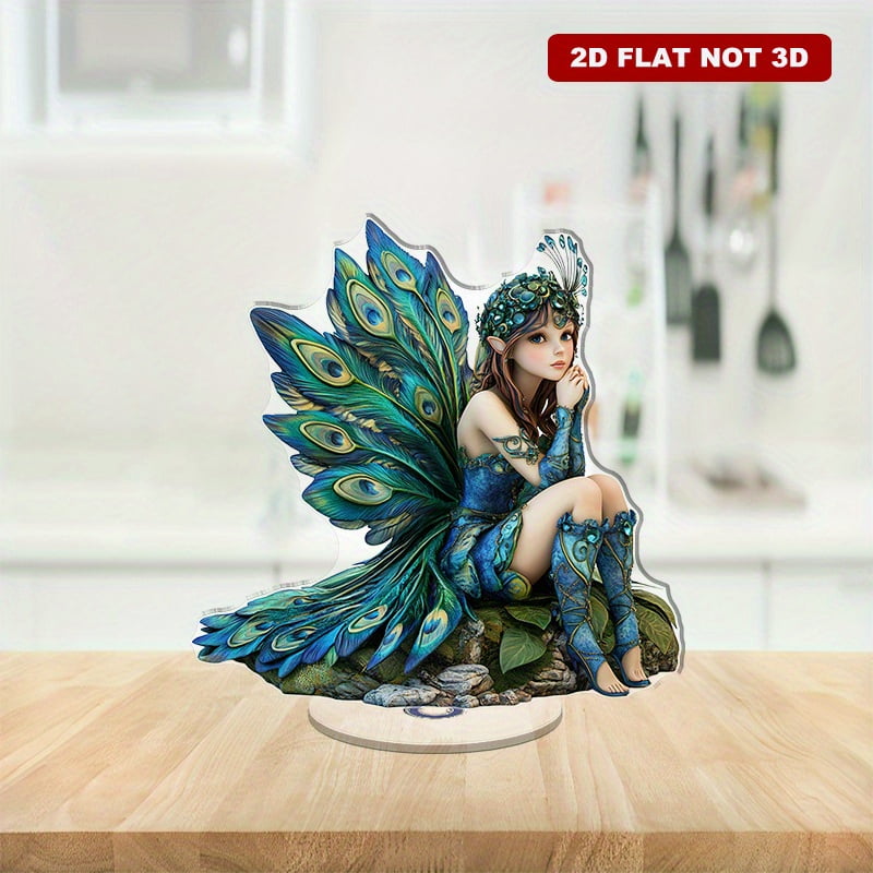 Rotating acrylic sculpture featuring a peacock fairy with vibrant blue and green feather wings ...