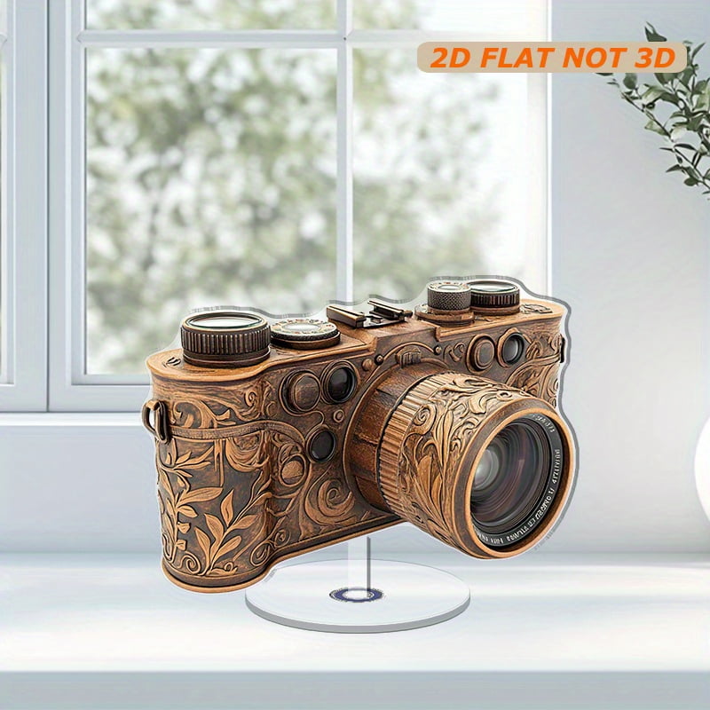 Rotating acrylic sculpture featuring a vintage film camera with large ...