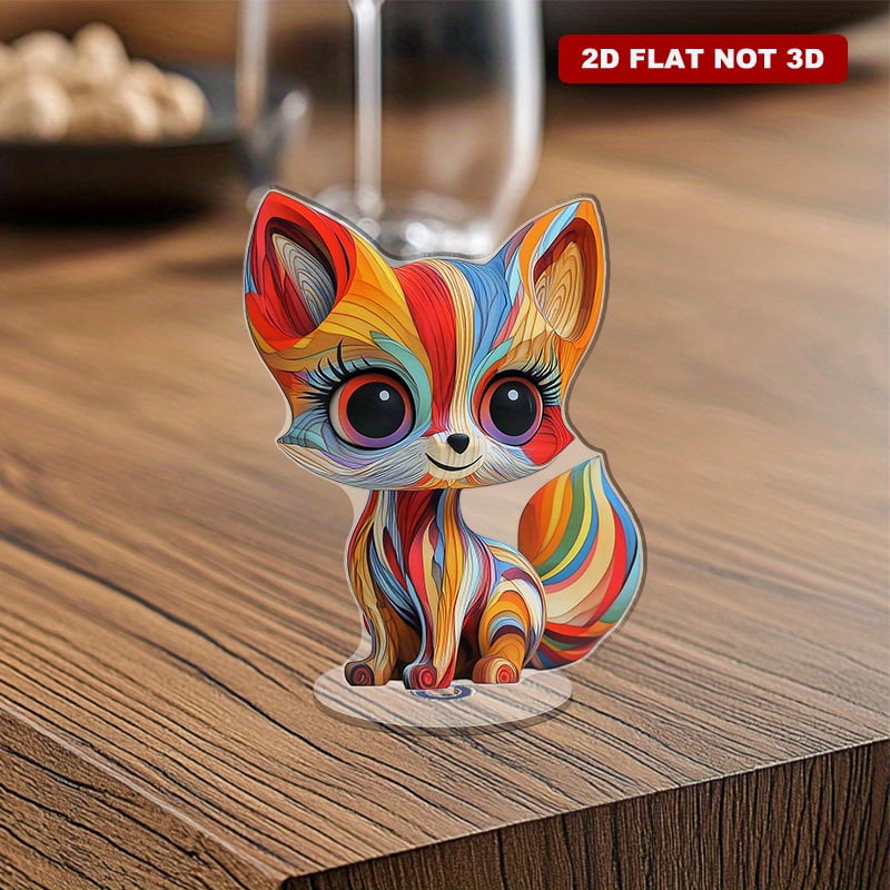 Rotating acrylic sculpture of a colorful fox with big eyes and ...