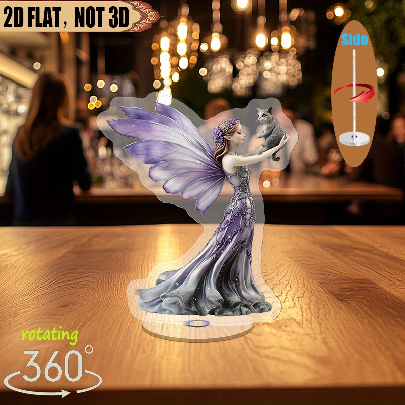 Rotating acrylic tabletop ornament featuring a radiant fairy queen with ...