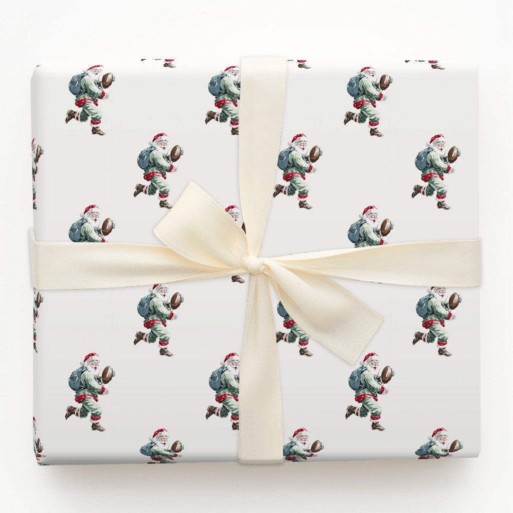 Running Santa Claus with Football Christmas Gift Wrapping Paper ...