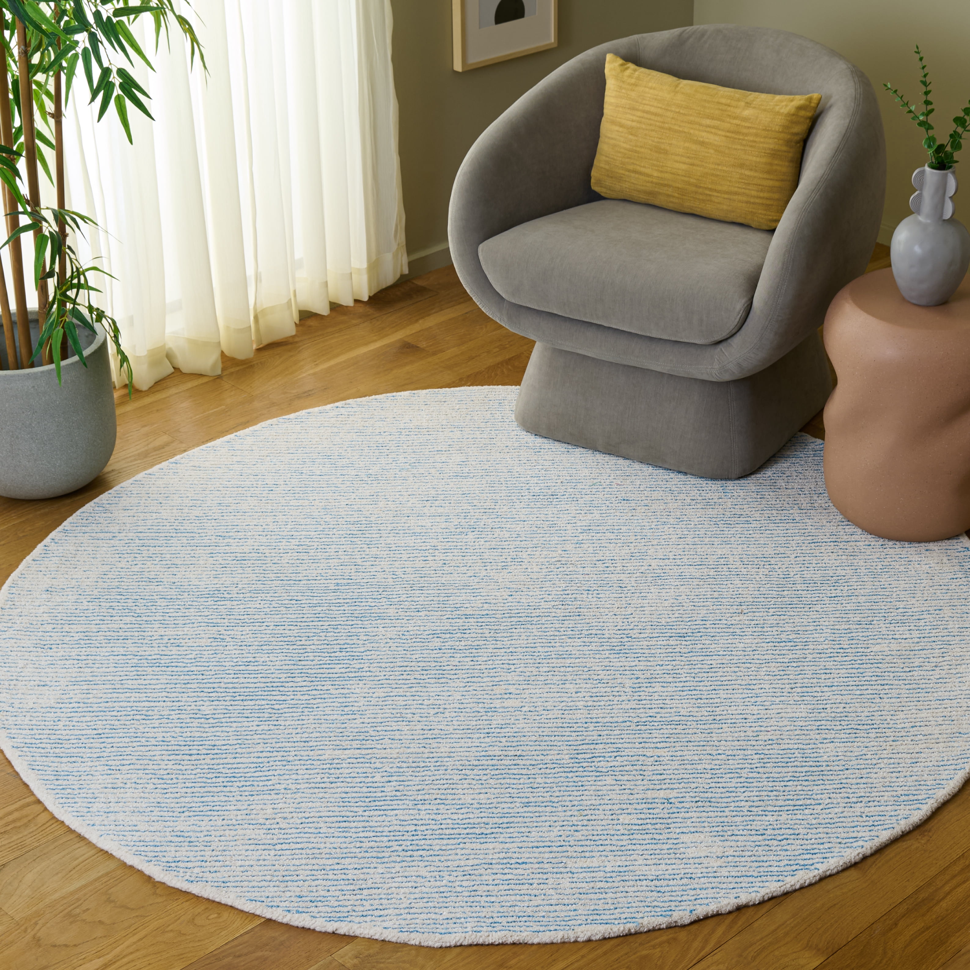 SAFAVIEH Abstract Rumen Solid Color Area Rug, Ivory/Blue, 6' x 6' Round ...