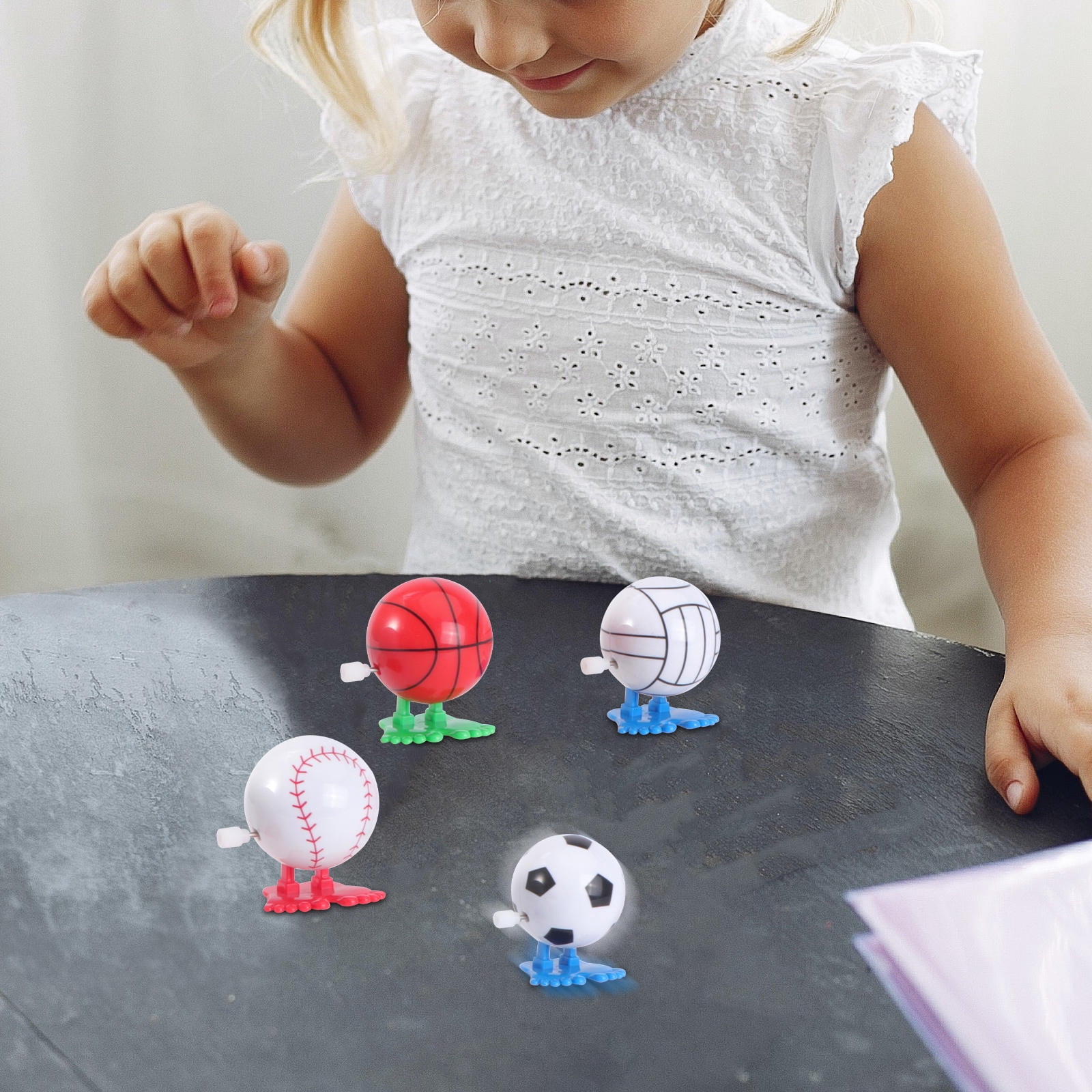 SEWCHICS Clockwork Toy with Ball Design for Kids Playing Assorted Color ...