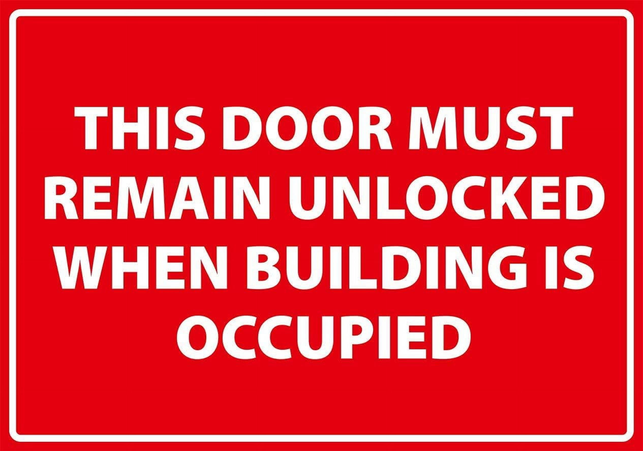 Safety sign, Directional sign "This door must remain unlocked when ...