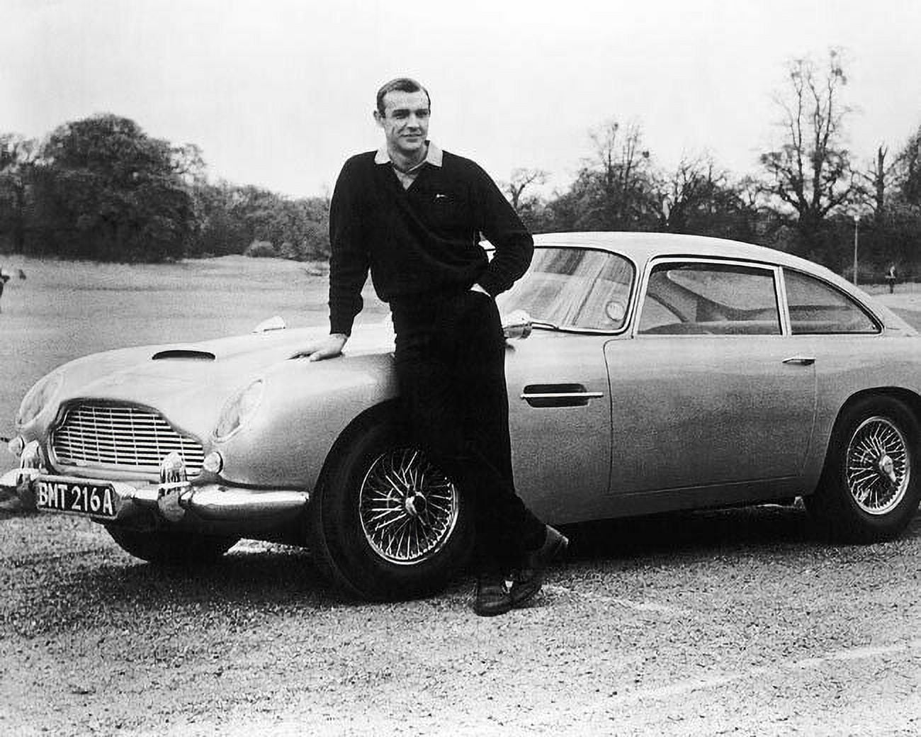 Sean Connery iconic pose with Aston Martin by golf course Goldfinger ...
