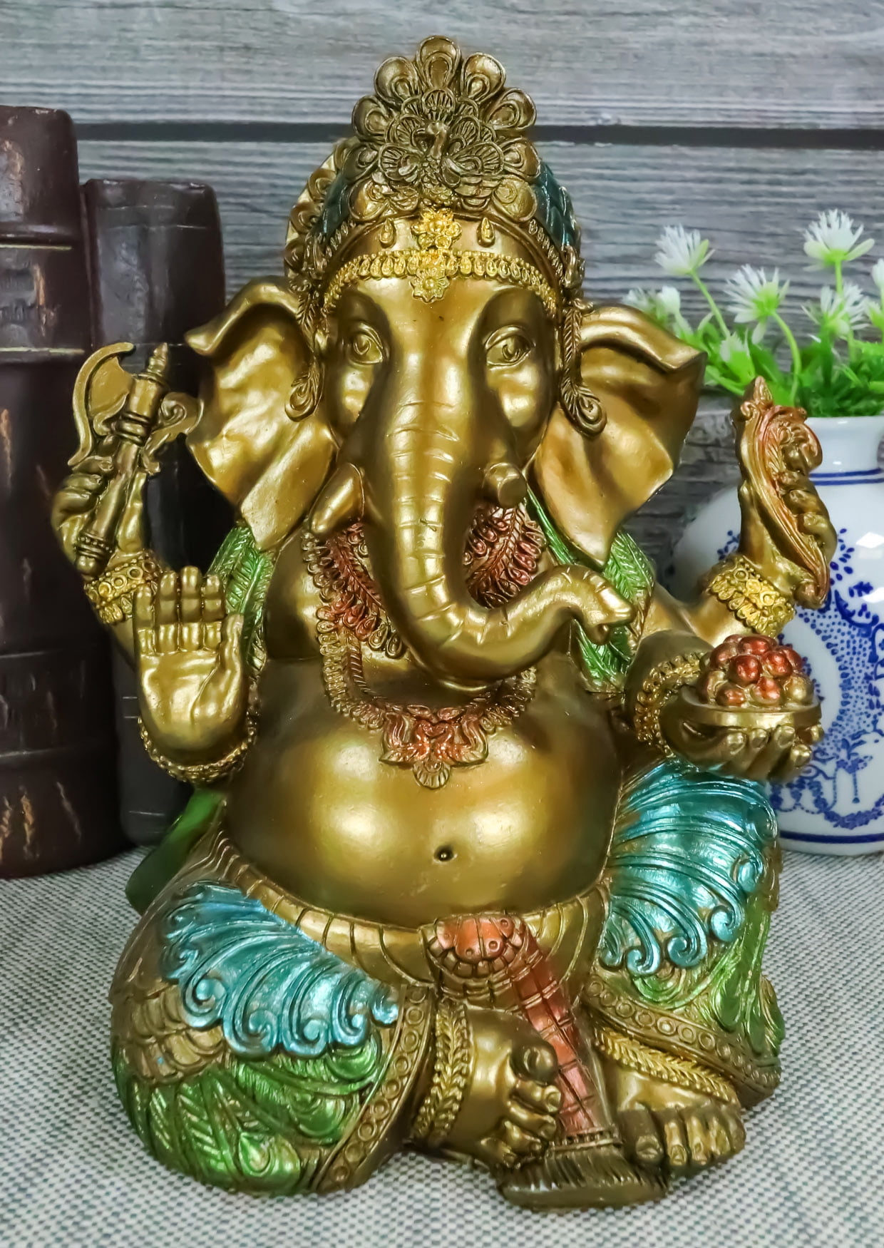 Seated Hindu God Ganesha Ganapati Holding Trident Axe and Modaka Bowl ...
